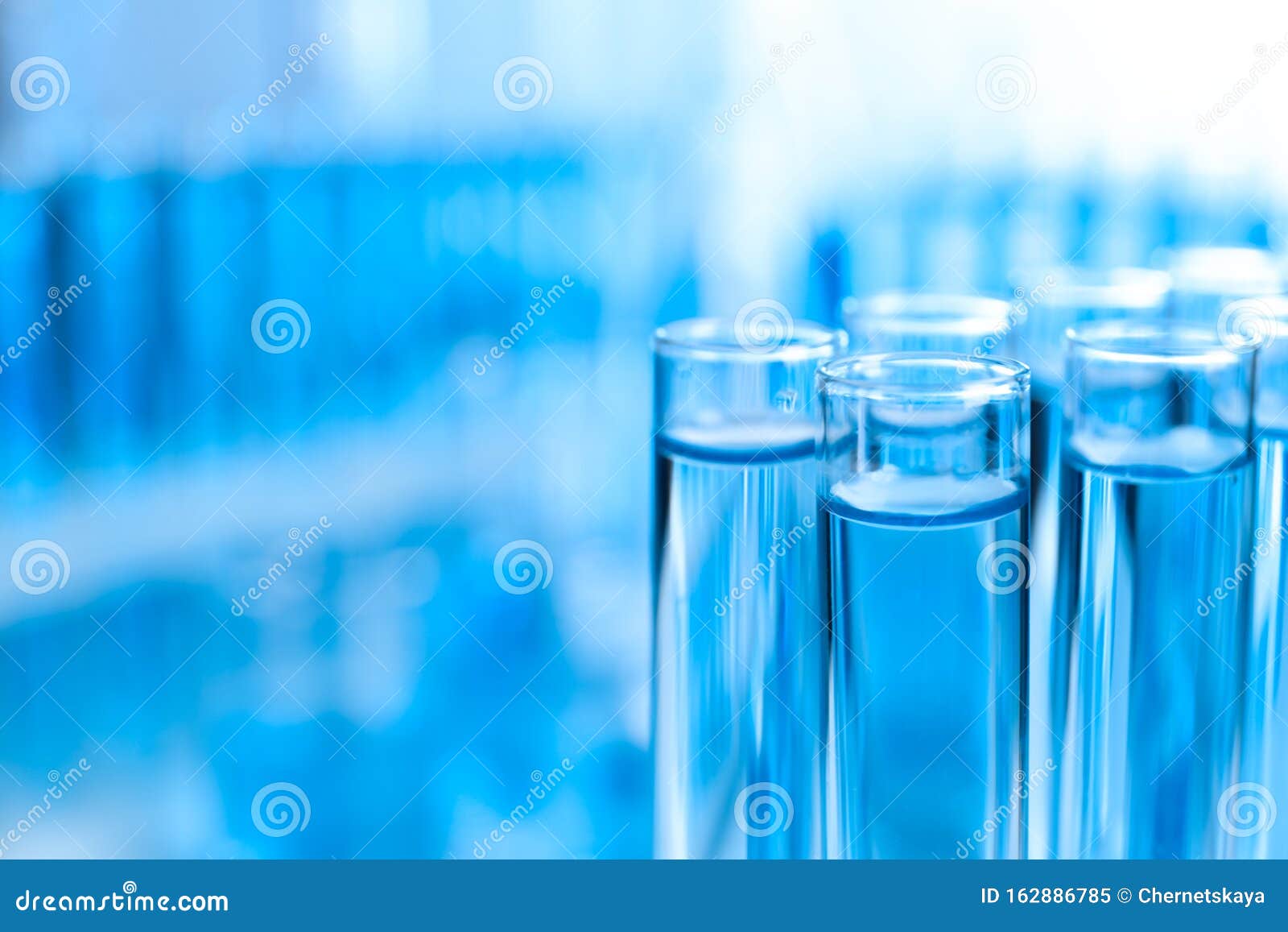 Test Tubes with Liquid Samples for Analysis in Laboratory. Space for ...