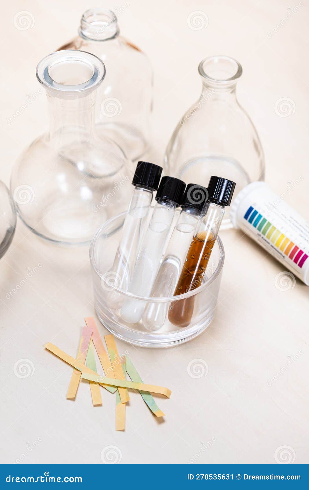 Test Tubes with Liquids, Flask and Indicator Paper Stock Image - Image ...