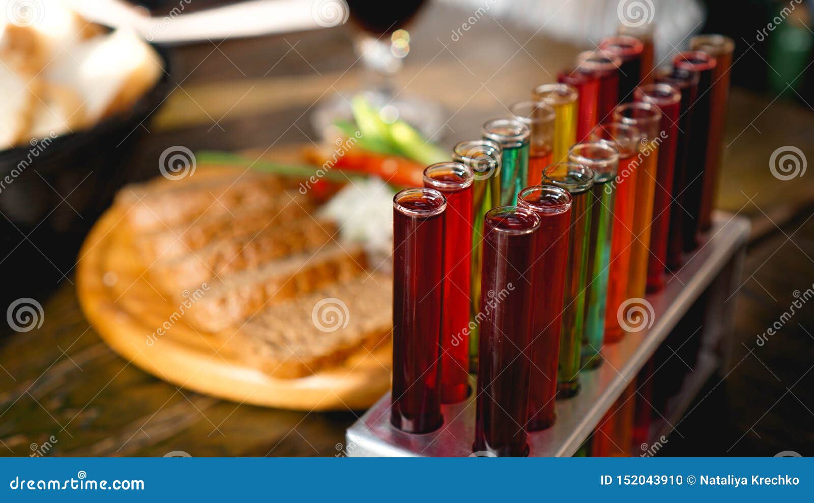 Test Tubes with Multi-colored Liquid. Alcohol in Test Tubes Dark Bar ...