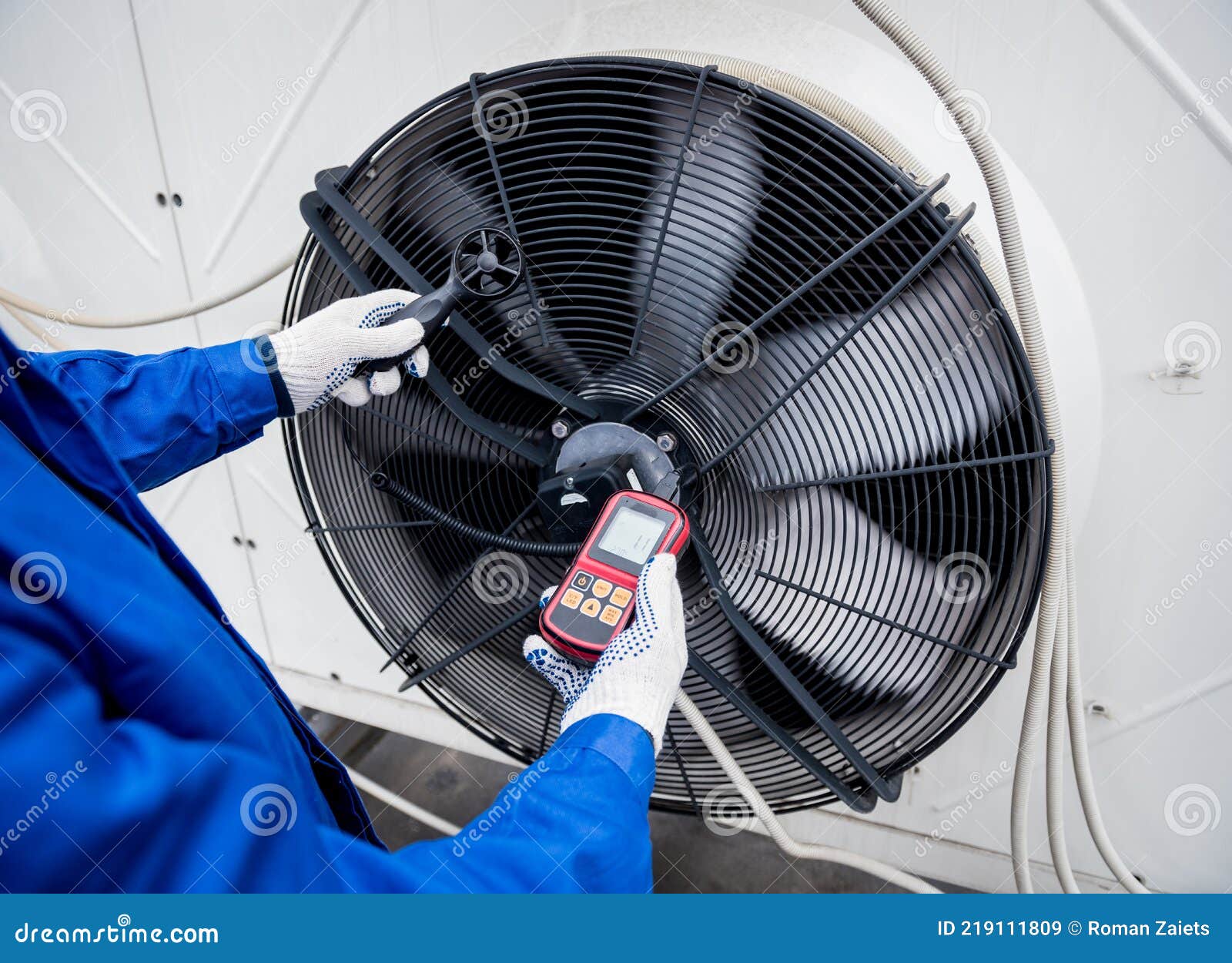 Testing with an Anemometer of an Axial Fan of the Condensing Unit Stock ...