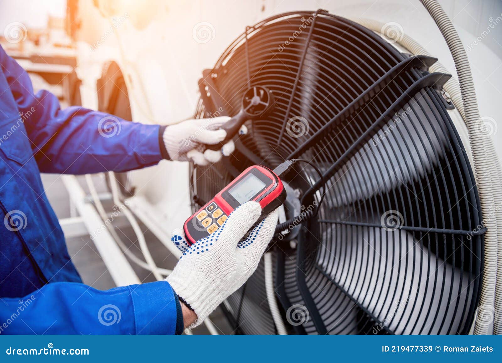 Testing with an Anemometer of an Axial Fan of the Condensing Unit Stock ...