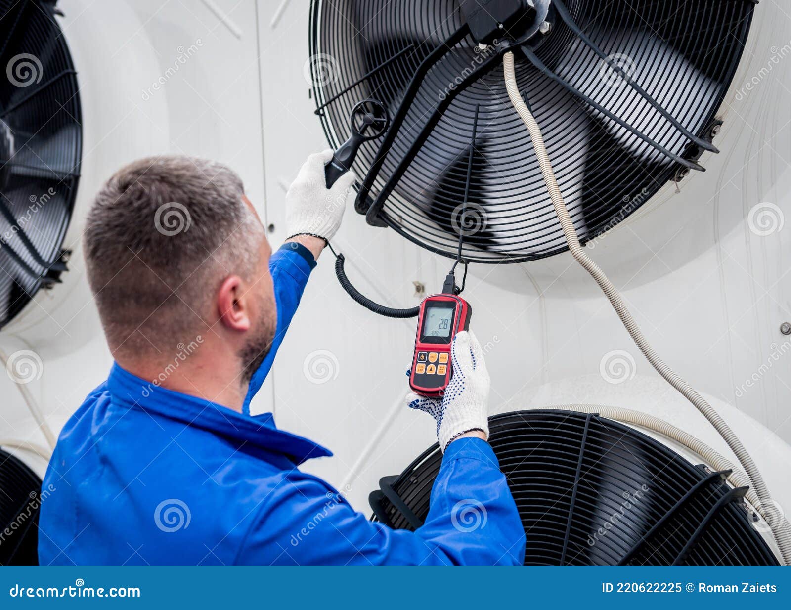 Testing with an Anemometer of an Axial Fan of the Condensing Unit Stock ...