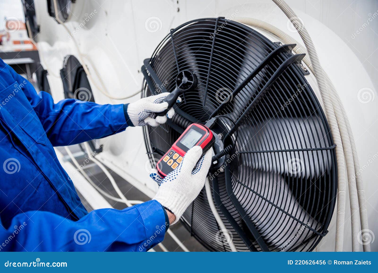 Testing with an Anemometer of an Axial Fan of the Condensing Unit Stock ...