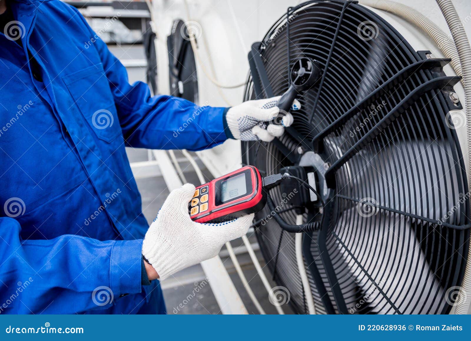 Testing with an Anemometer of an Axial Fan of the Condensing Unit Stock ...