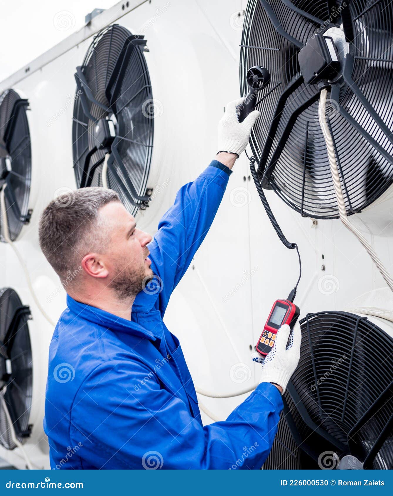 Testing with an Anemometer of an Axial Fan of the Condensing Unit Stock ...