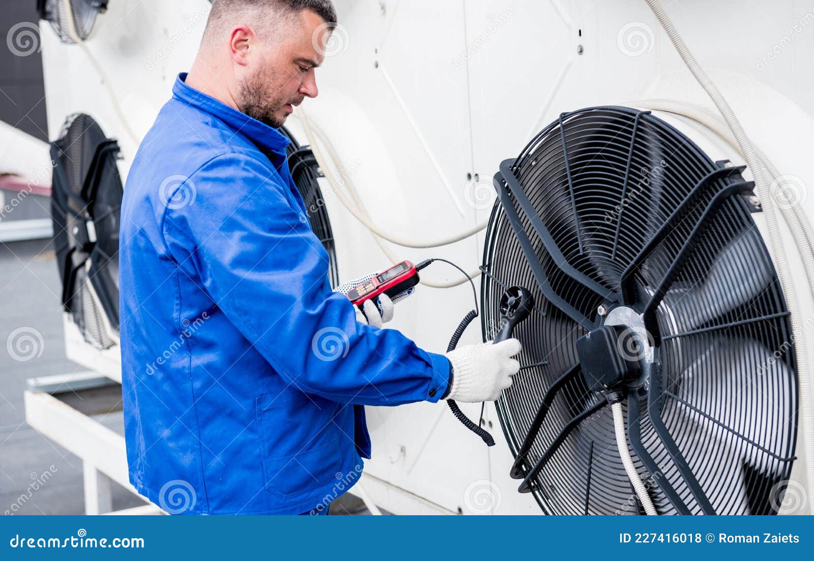 Testing with an Anemometer of an Axial Fan of the Condensing Unit Stock ...
