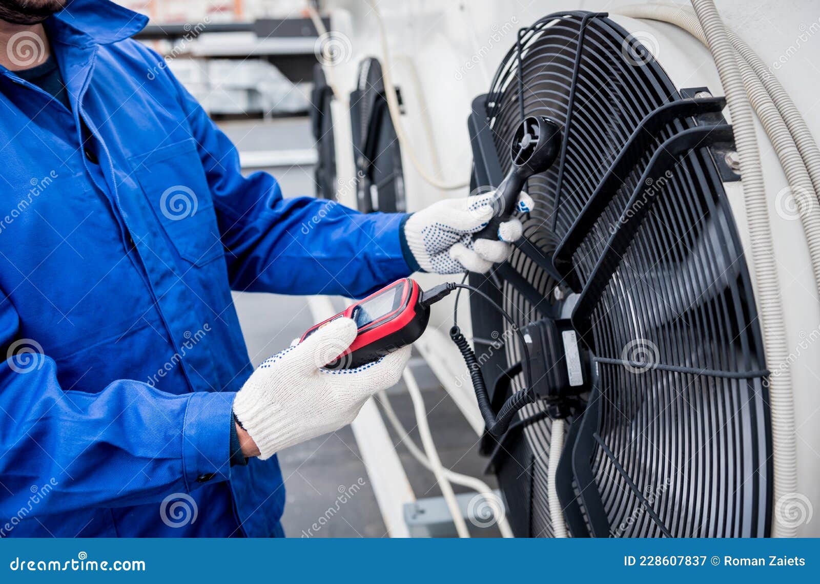 Testing with an Anemometer of an Axial Fan of the Condensing Unit Stock ...