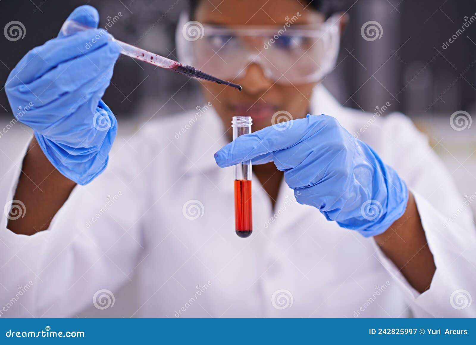 Testing Blood Samples. a Front View of a Young Scientist Dropping a ...