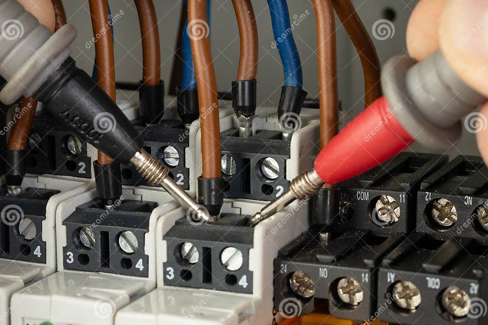Testing Electrical Connections with Probes in a Terminal Block Stock ...