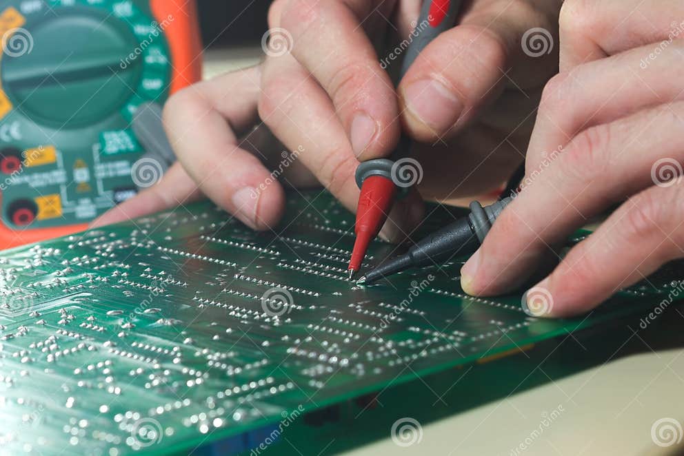 Testing Pcb Board To Short Circut with Multimeter Stock Photo - Image ...