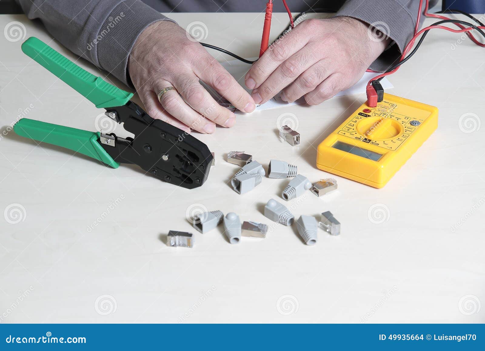 Testing a RJ45 connector stock photo. Image of measure - 49935664