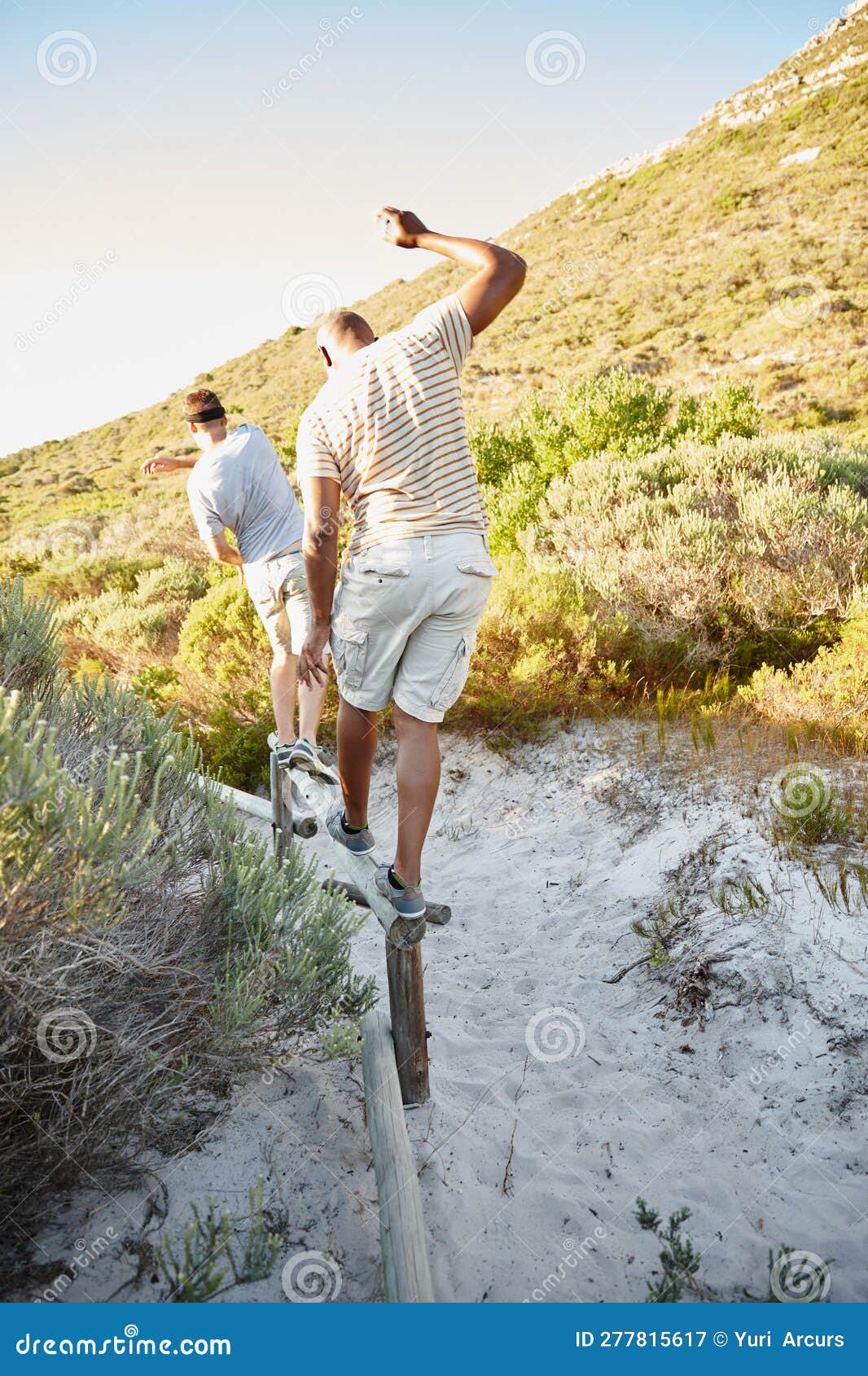 Testing Their Agility. Two Men Walking Across an Obstacle Challenging ...
