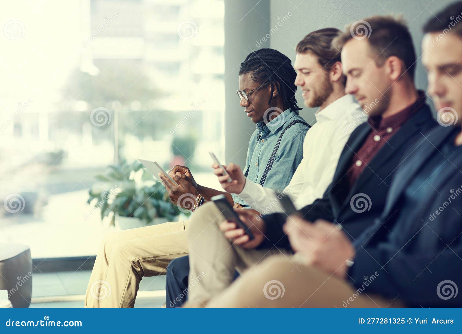 Testing Their Social Networking Skills. a Group of Businessmen Using ...