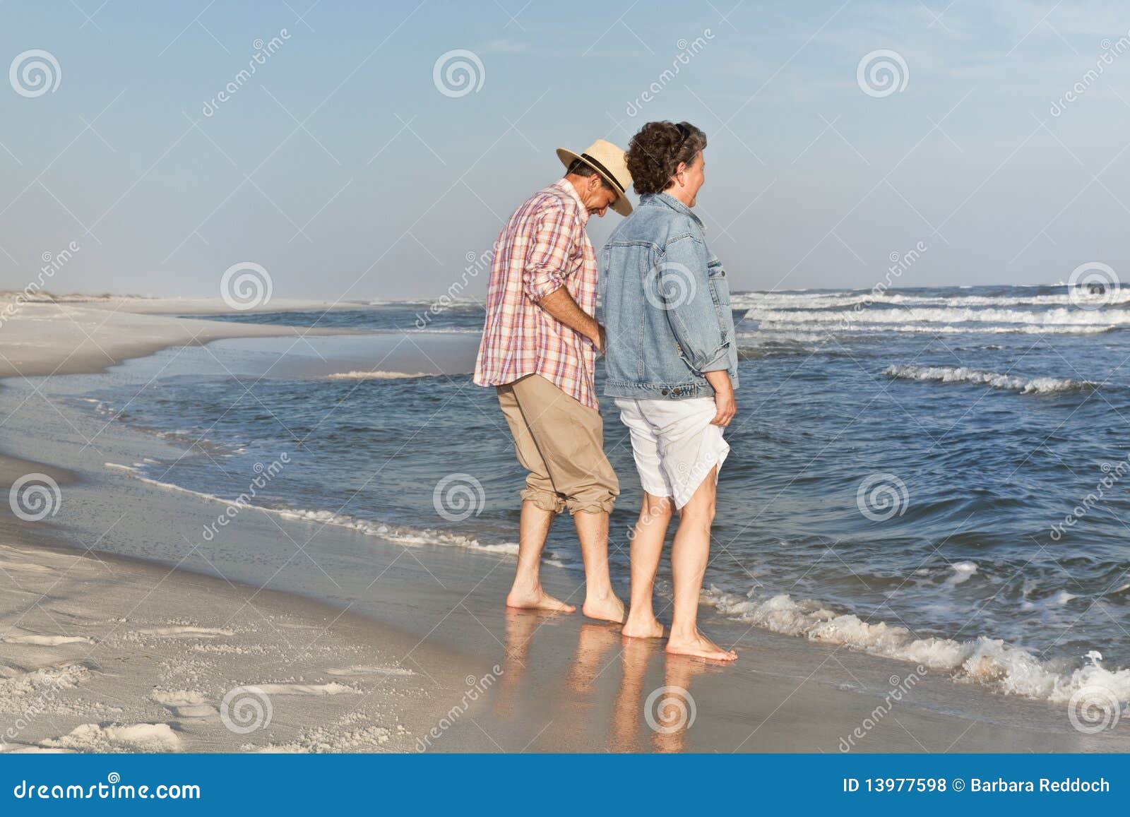 Testing the Water at the Beach Stock Photo - Image of surf, waterfront ...