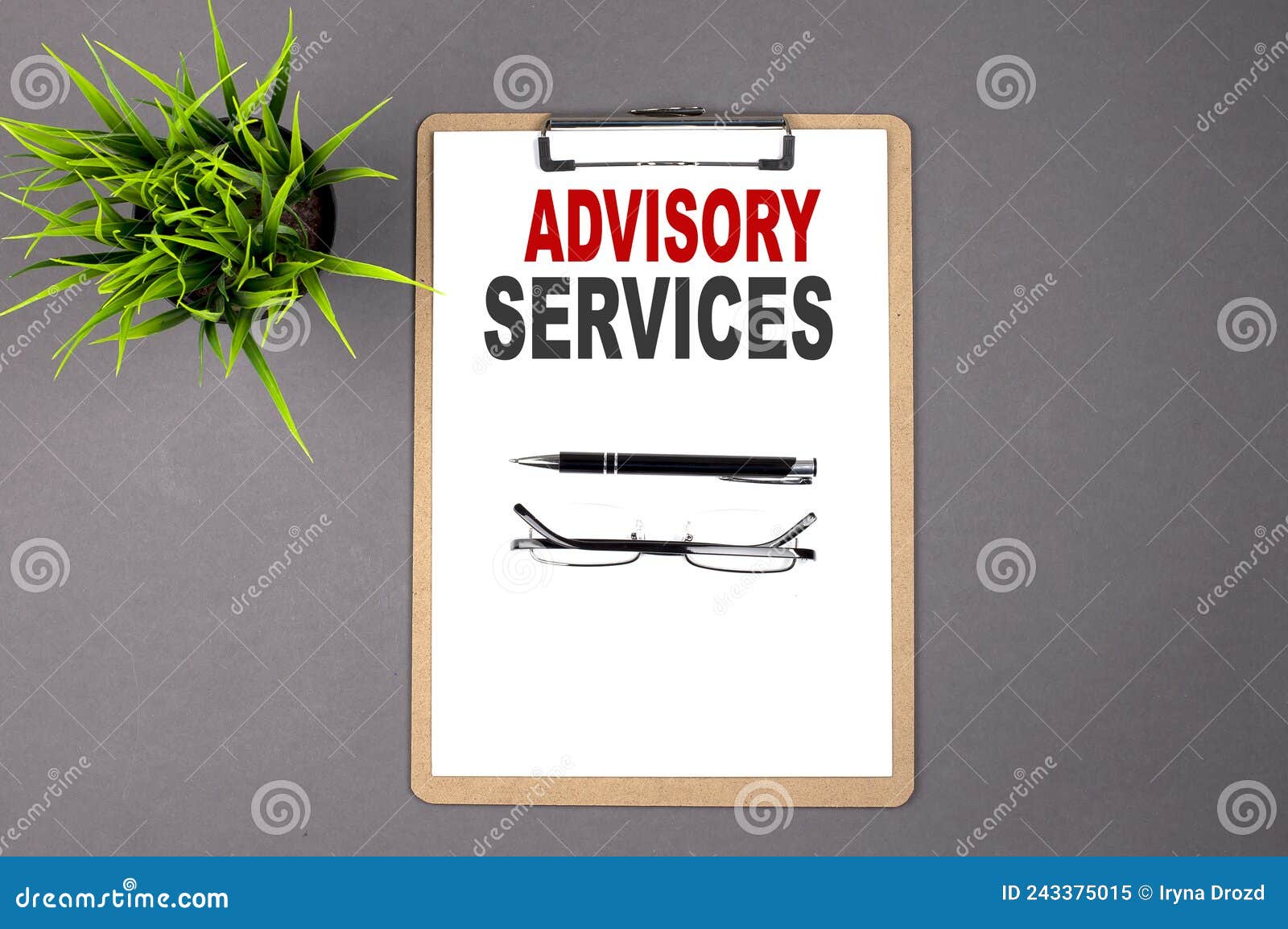 Text ADVISORY SERVICES on Brown Clipboard on the Grey Background ...
