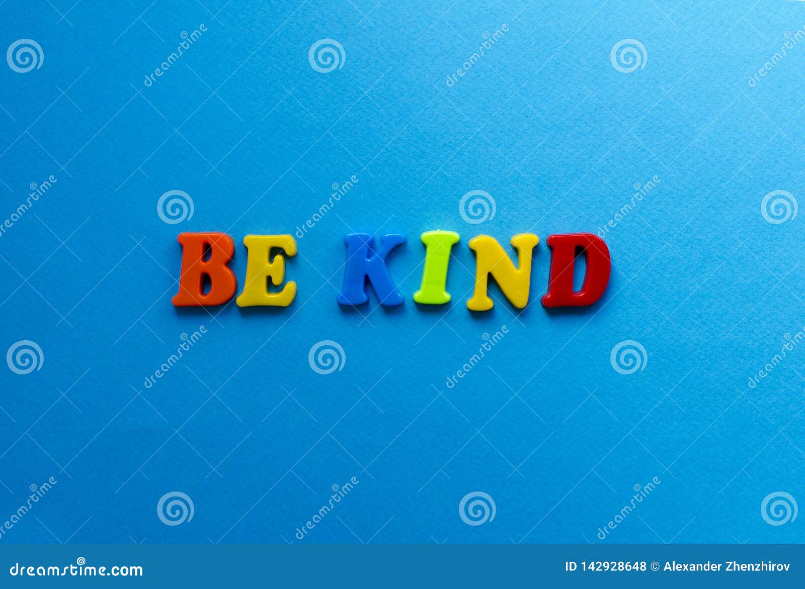 Text Be Kind from Plastic Colored Letters on Blue Paper Background ...