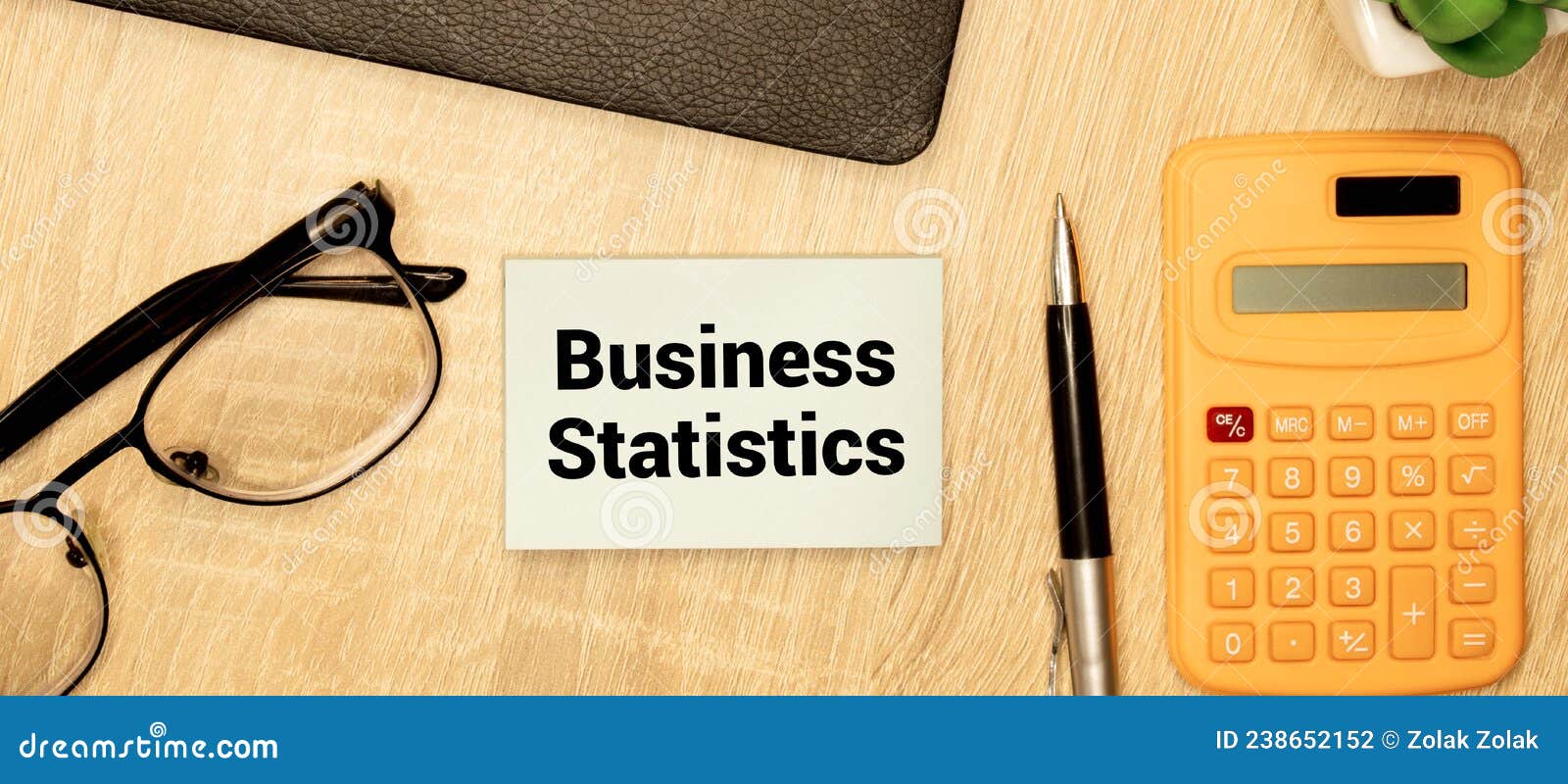 Text BUSINESS STATISTICS on Sticker on Notepad on Diagram Background ...