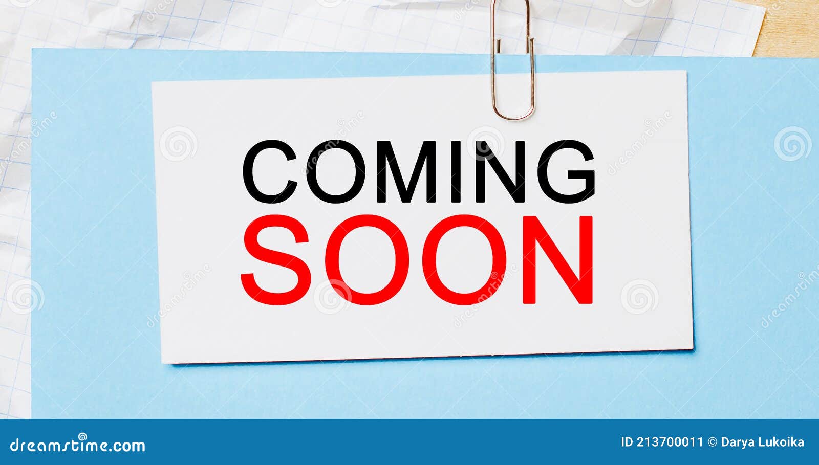 Text COMING SOON on a White Card on a Blue Background. Business Concept ...
