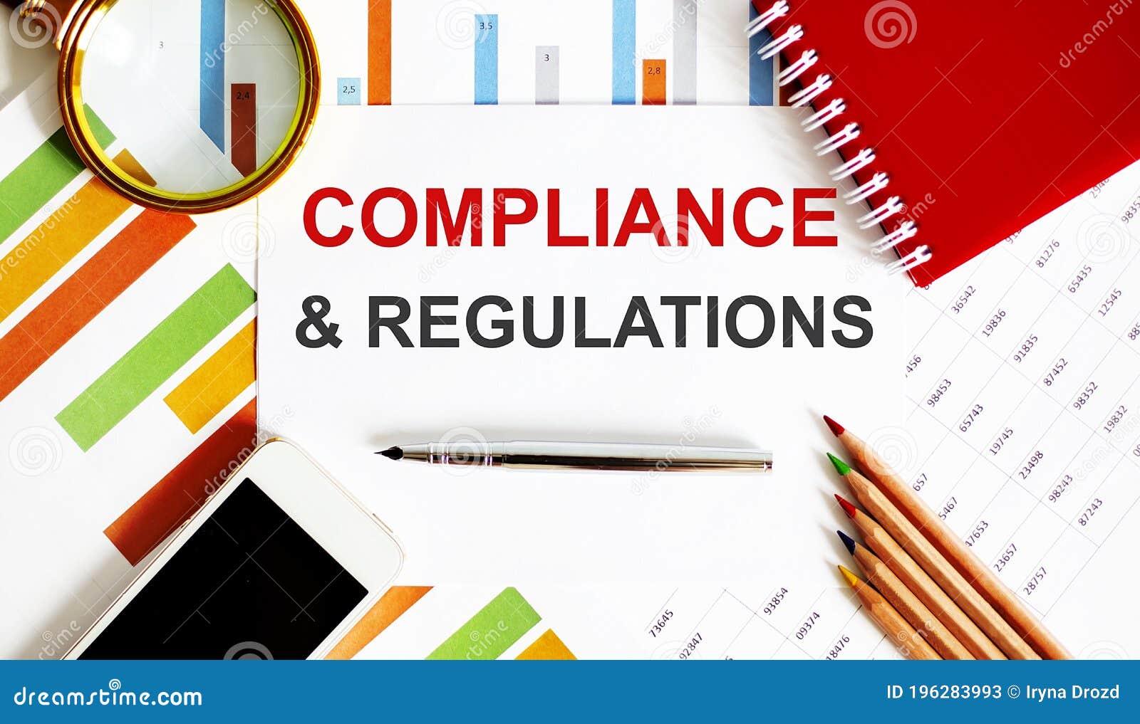 Text COMPLIANCE and REGULATIONS on the Notepad with Office Tools, Pen ...