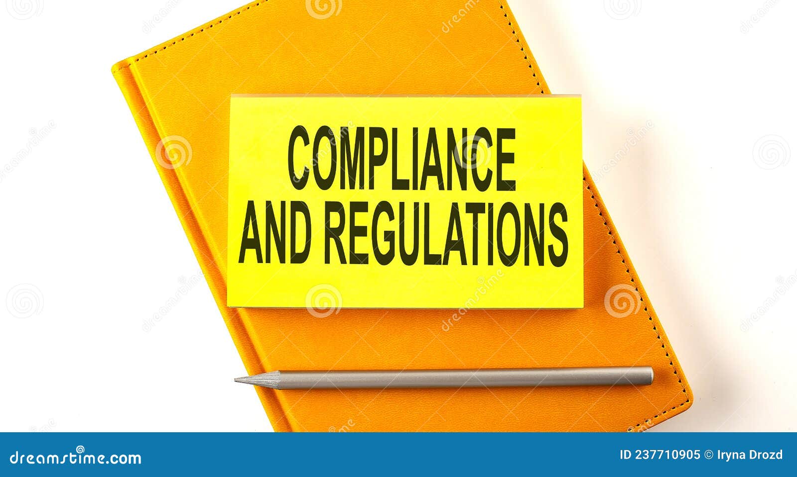 Text Compliance and Regulations on the Sticker on the Yellow Notebook ...