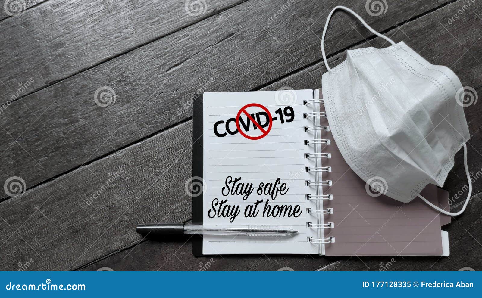 Text Covid-19 Stay Safe Stay at Home with Stop Sign Written on Notepad ...