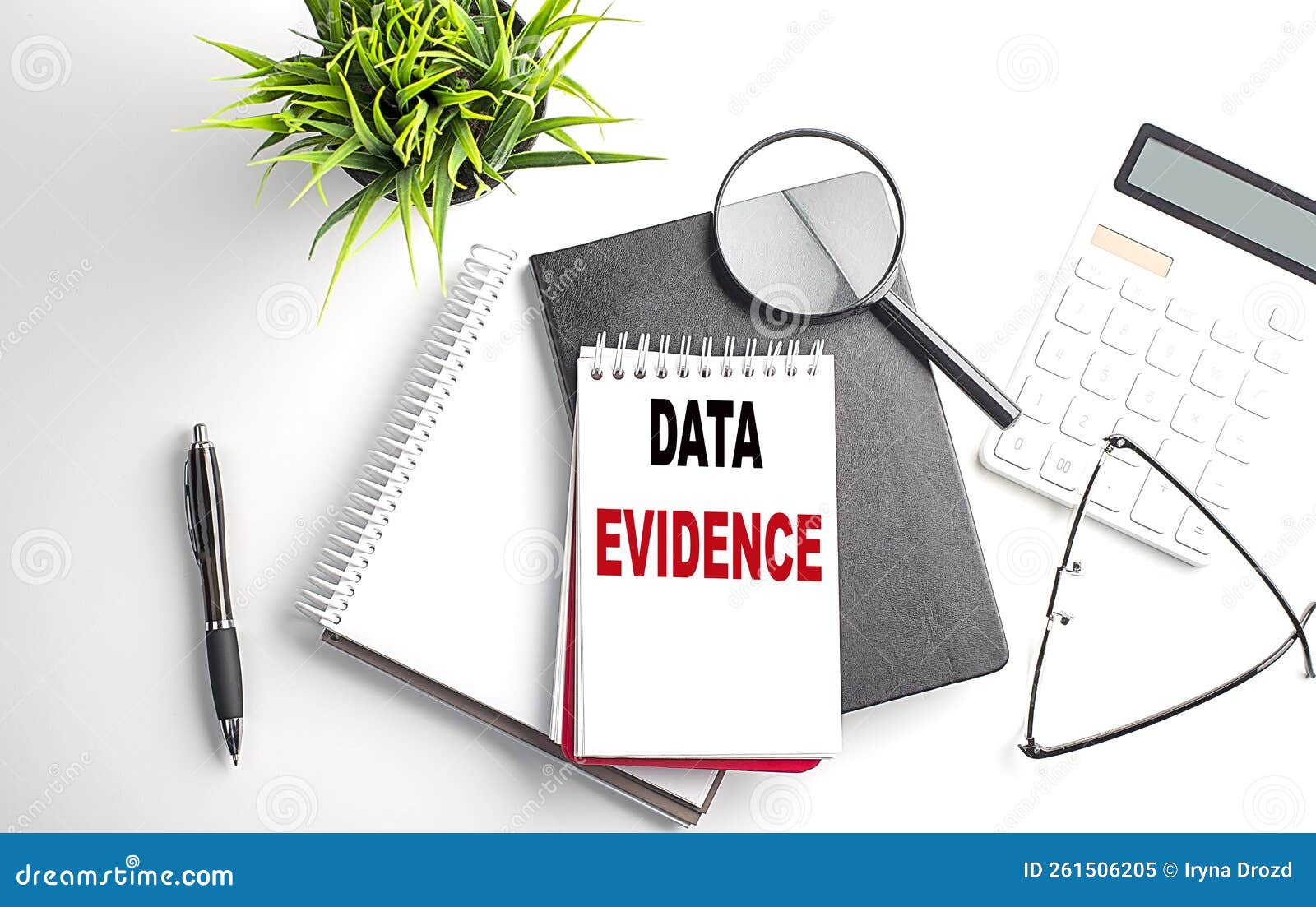 Text DATA EVIDENCE on Notebook with Office Tools on White Background ...