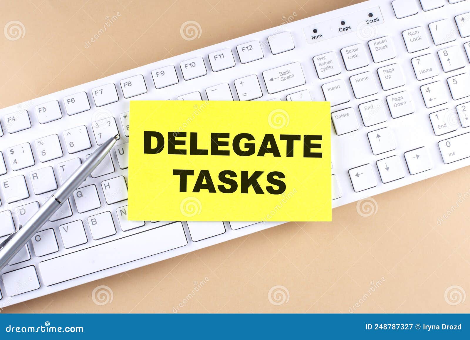 Text DELEGATE TASKS Text on a Sticky on Keyboard, Business Concept ...