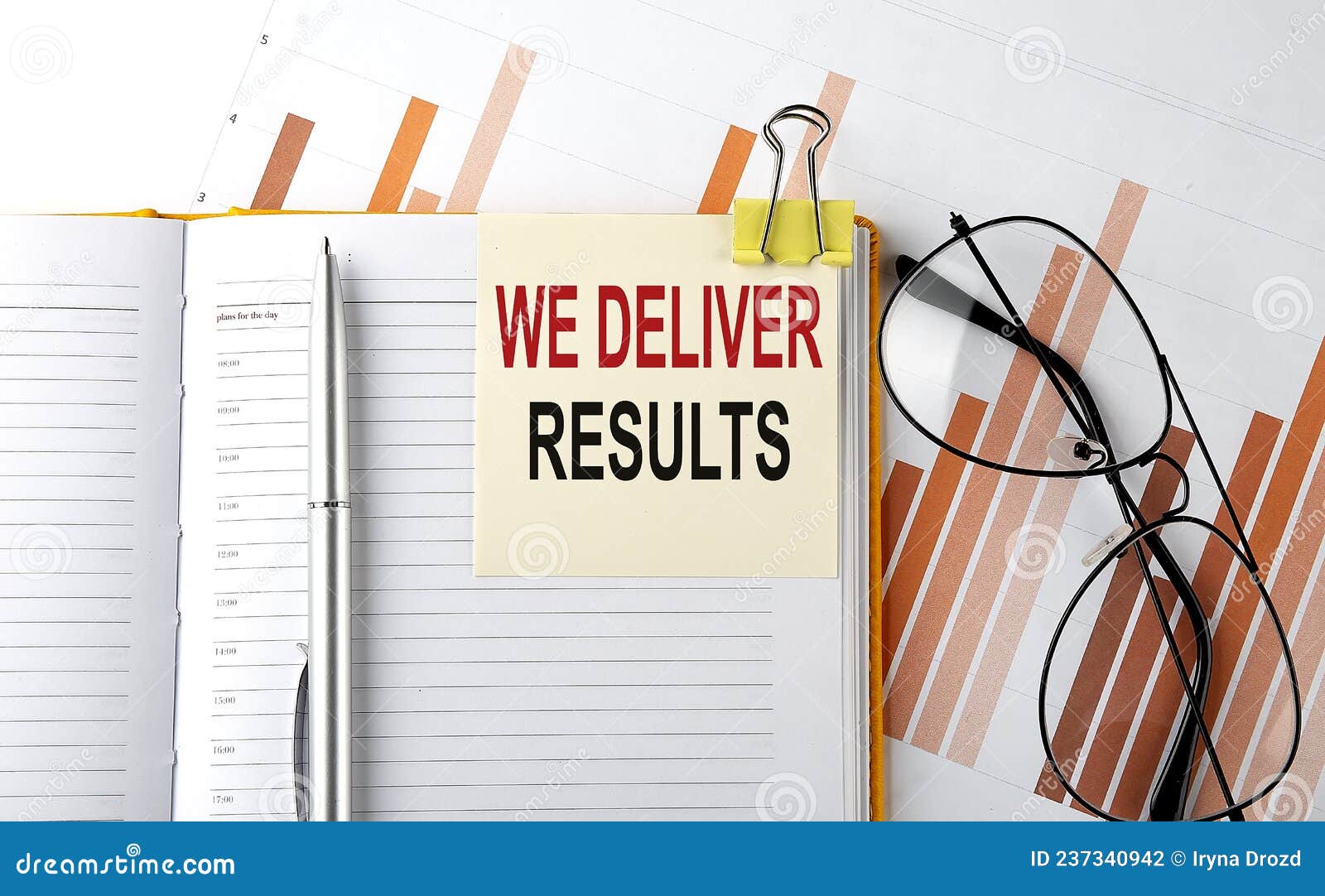 Text we DELIVER RESULTS on Sticker on the Notepad on Diagram Background ...