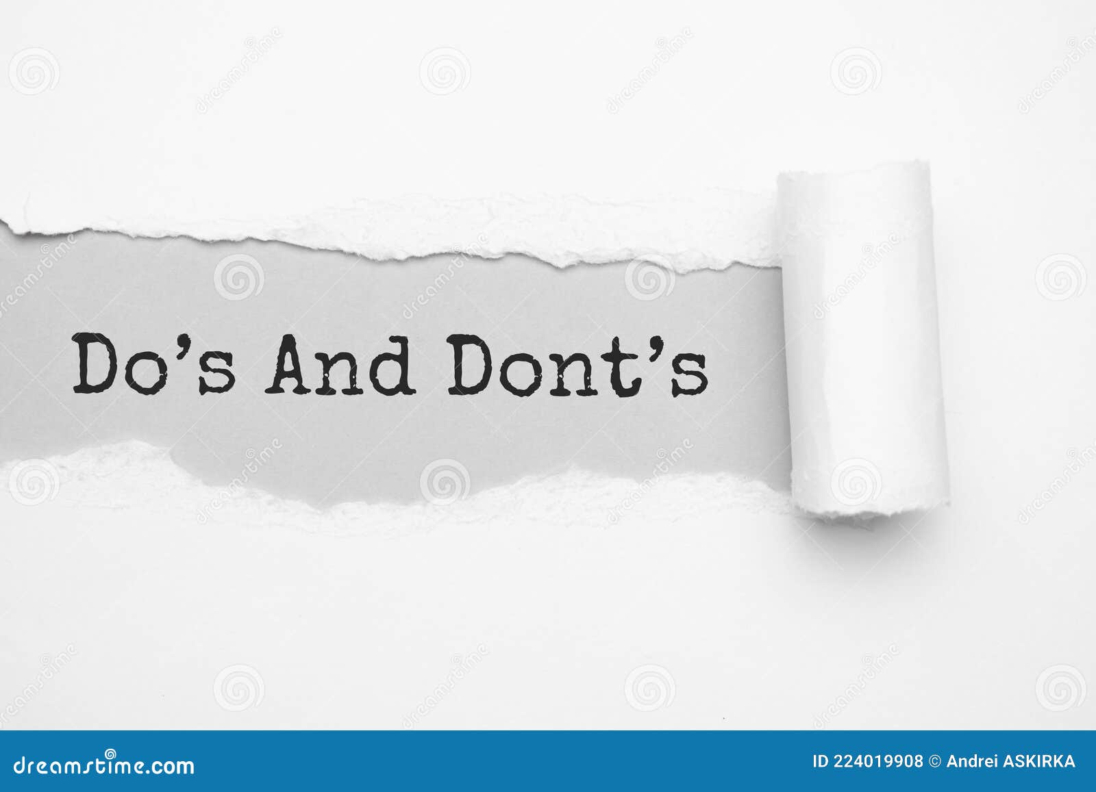 The Text DO S and DONTS Appearing Behind Torn Brown Paper Stock Photo ...