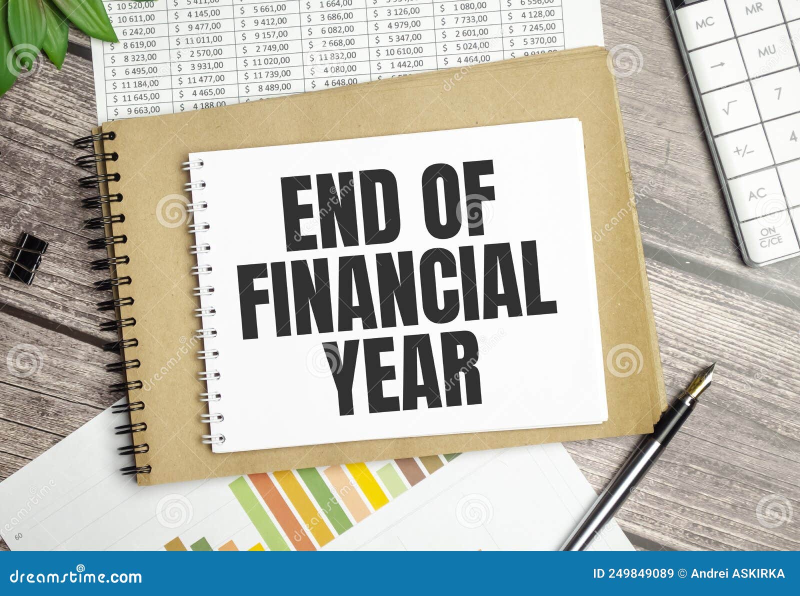 Text End of Financial Year on a Notebook on the Diagram and Charts with ...