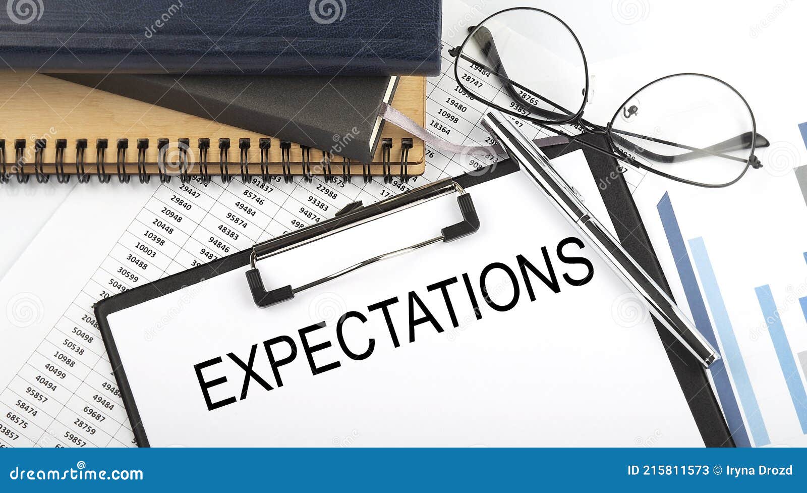 Text Expectations on Office Desk Table with Notebooks, Supplies ...