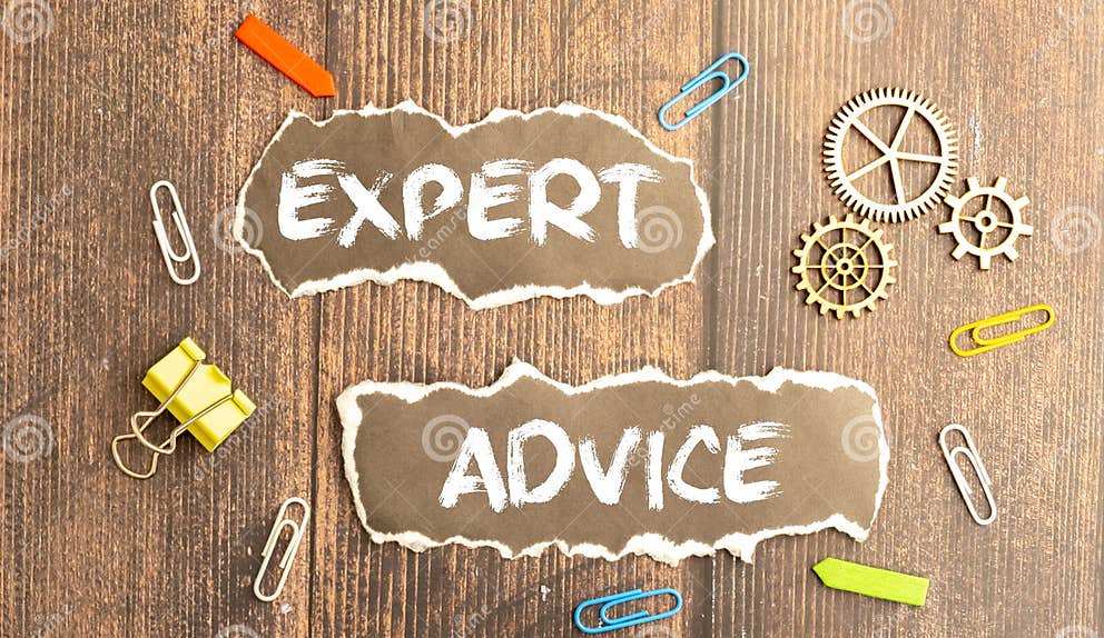 Text EXPERT ADVICE on a Notebook with Office Tools on White Background ...