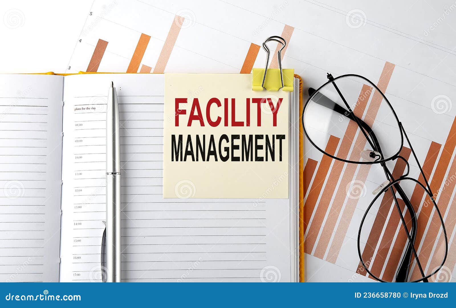 Text FACILITY MANAGEMENT on Sticker on the Notepad on Diagram ...