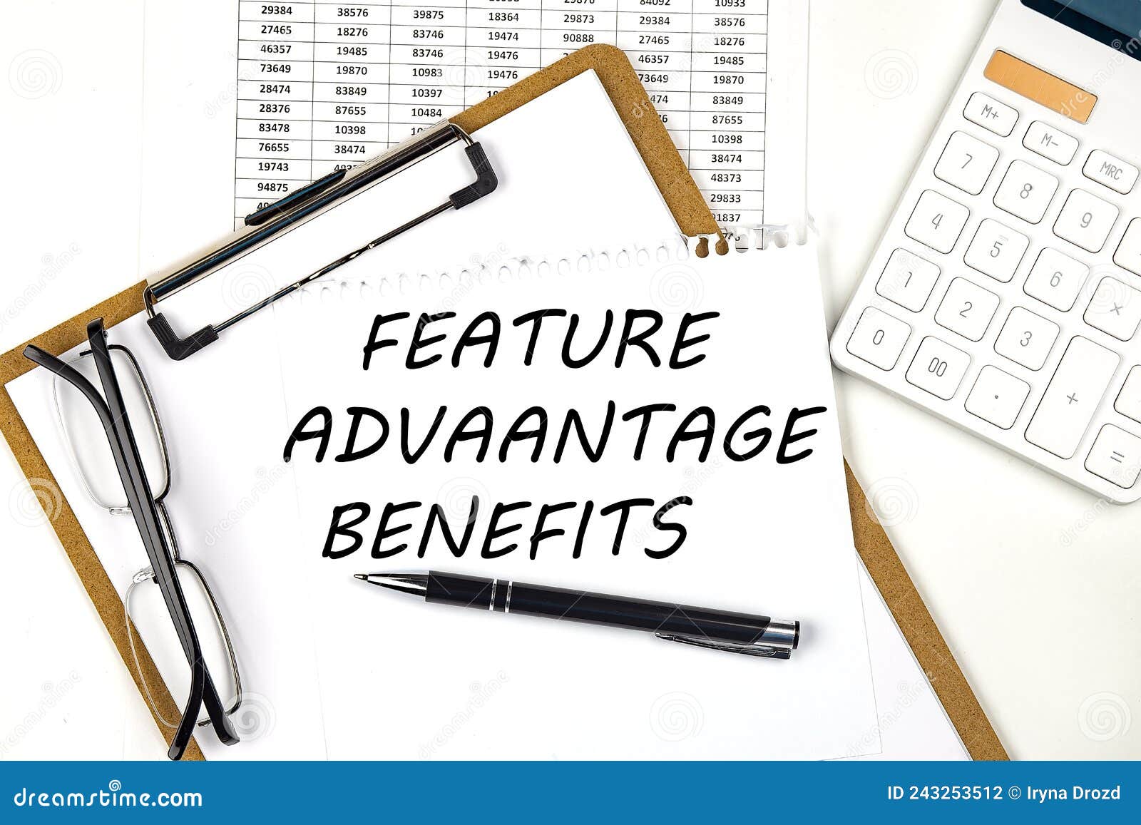 Text FEATURE ADVANTAGE BENEFITS on the White Paper on Clipboard with ...