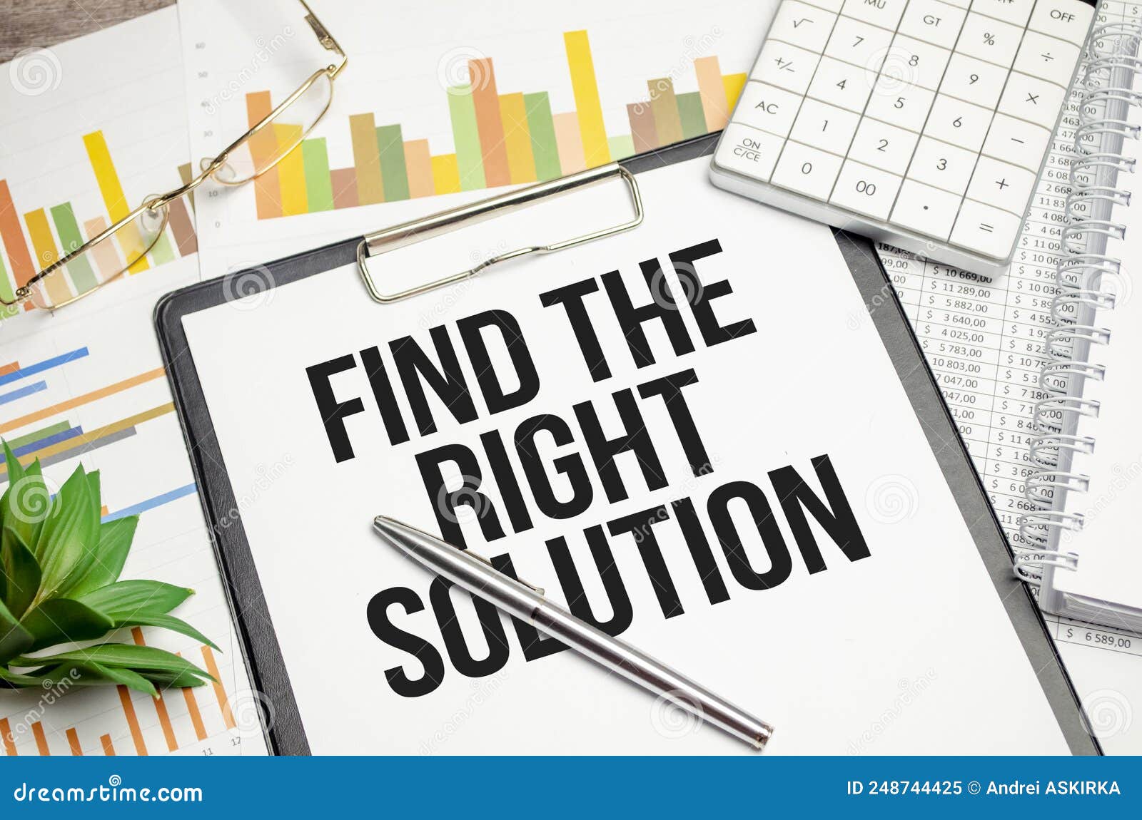 Text Find the Right Solution on File Folder with Charts and Pen Stock ...