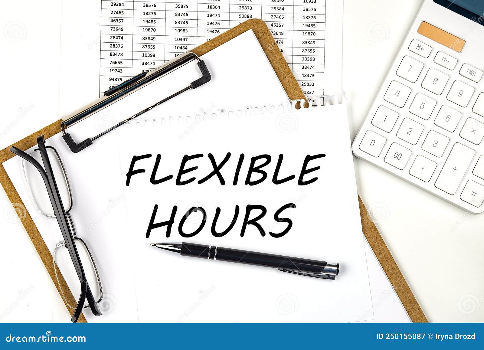 Text FLEXIBLE HOURS on the White Paper on Clipboard with Chart and ...