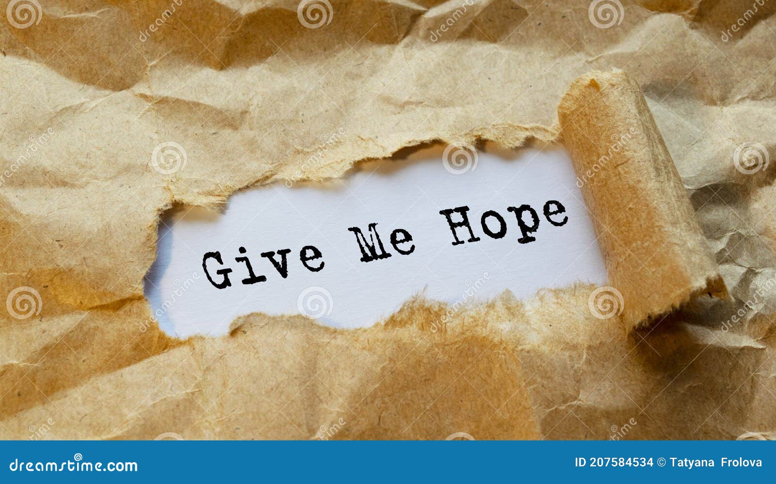 The Text GIVE ME HOPE, Appearing Behind Torn Paper. the Craft Paper is ...