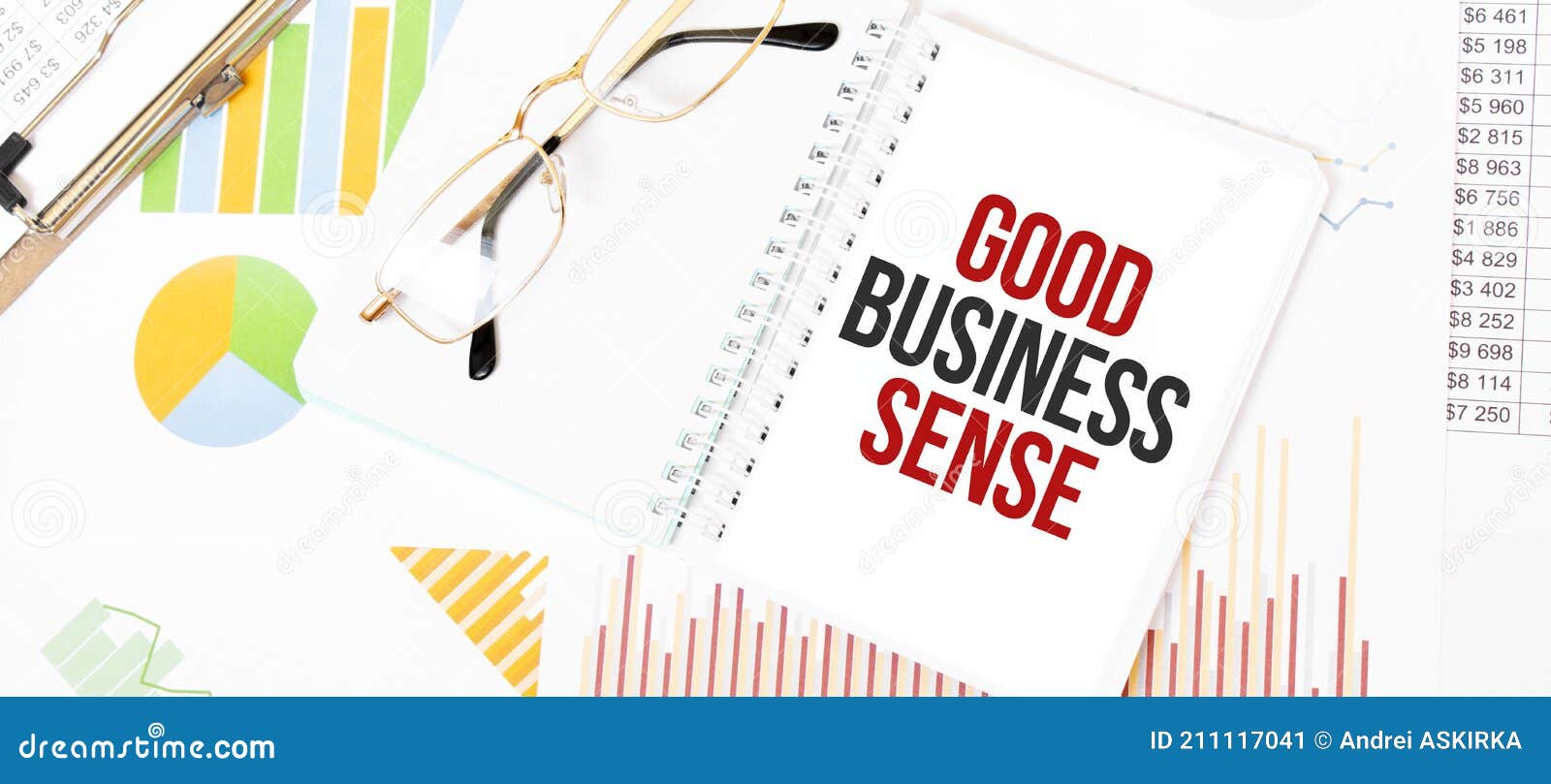 Text GOOD BUSINESS SENSE on White Notepad, Glasses, Graphs and Diagrams ...
