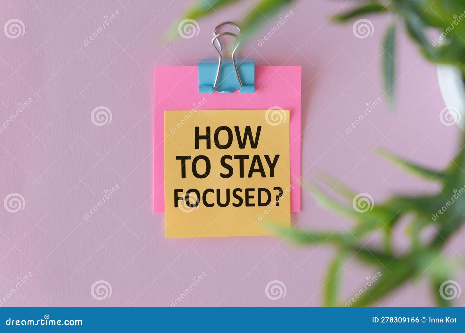 Text How To Stay Focused Appearing Behind Torn Yellow Paper Stock Photo ...