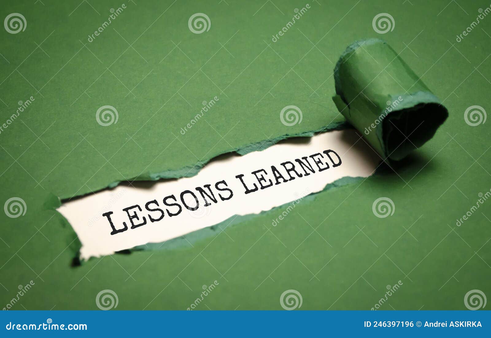 The Text LESSONS LEARNED Appearing Behind Torn Green Paper Stock Photo ...