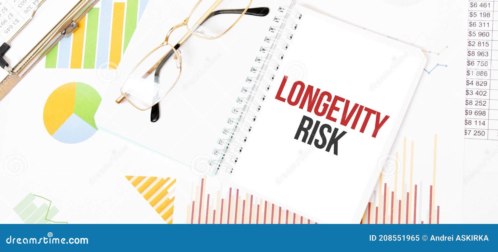 Text LONGEVITY RISK on White Notepad, Glasses, Graphs and Diagrams ...