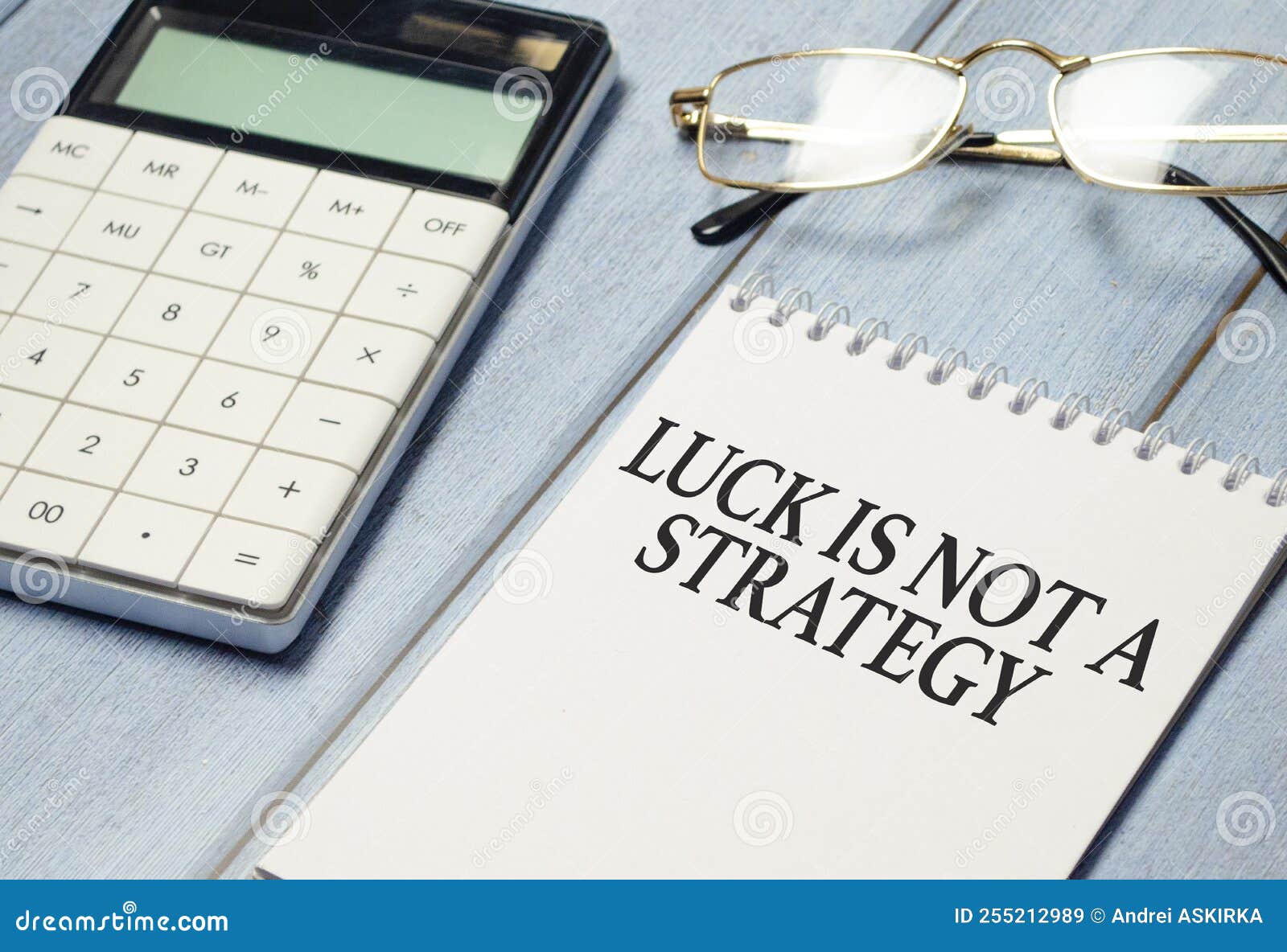 The Text Luck is Not a Strategy on Paper Notepad and Calculator Stock ...