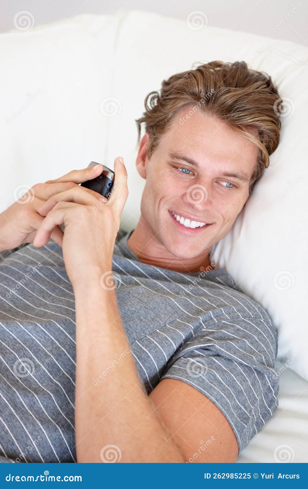 That Text Made My Day...a Handsome Young Man Smiling and Holding a ...