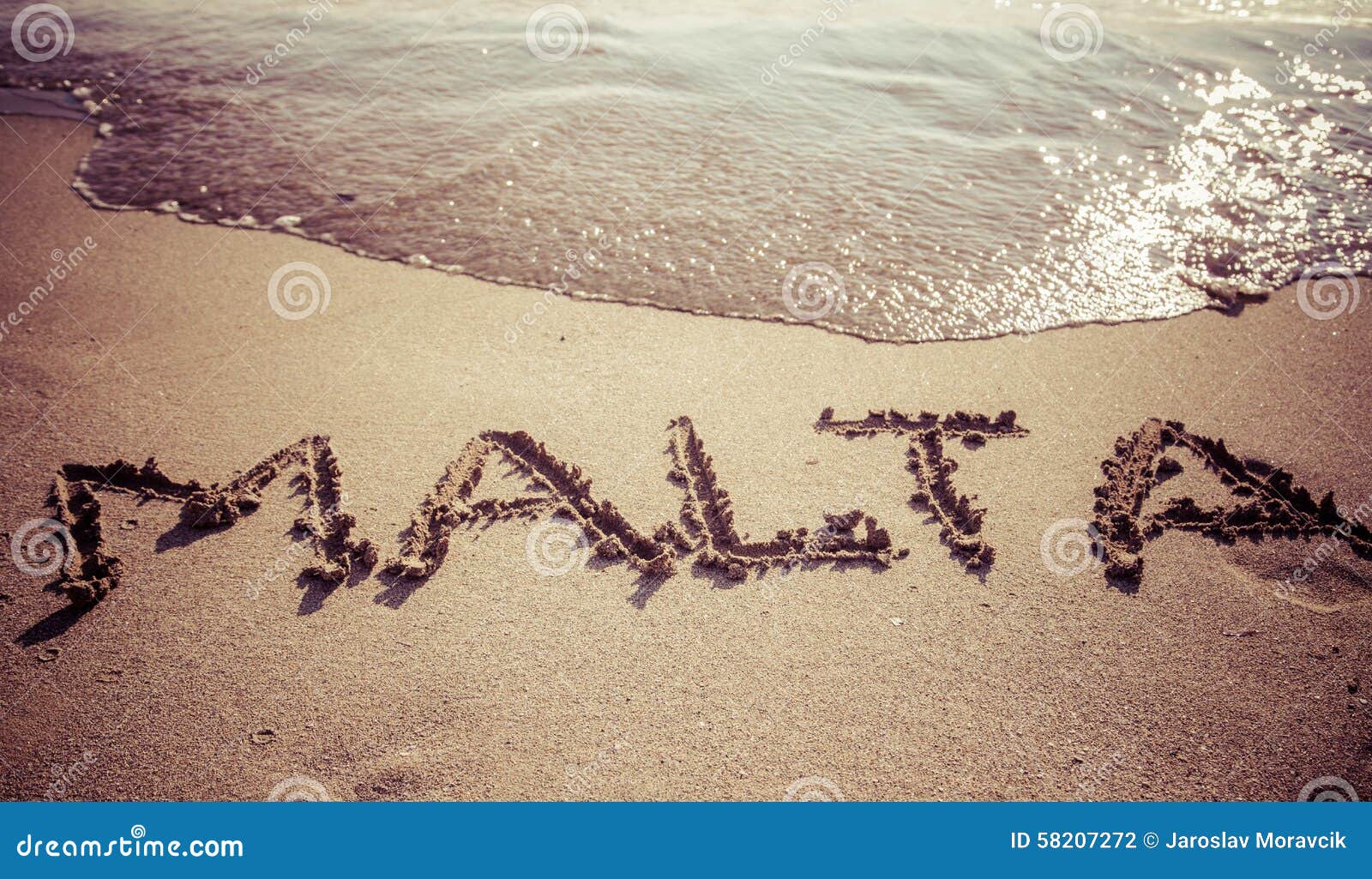Text Malta on the beach stock photo. Image of water, font - 58207272