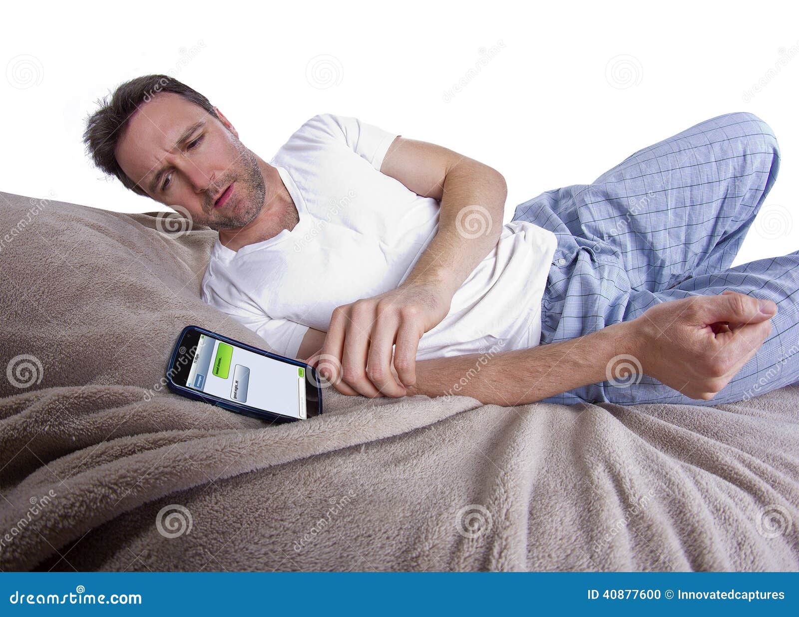 Text Messages in Bed stock photo. Image of home, adult - 40877600