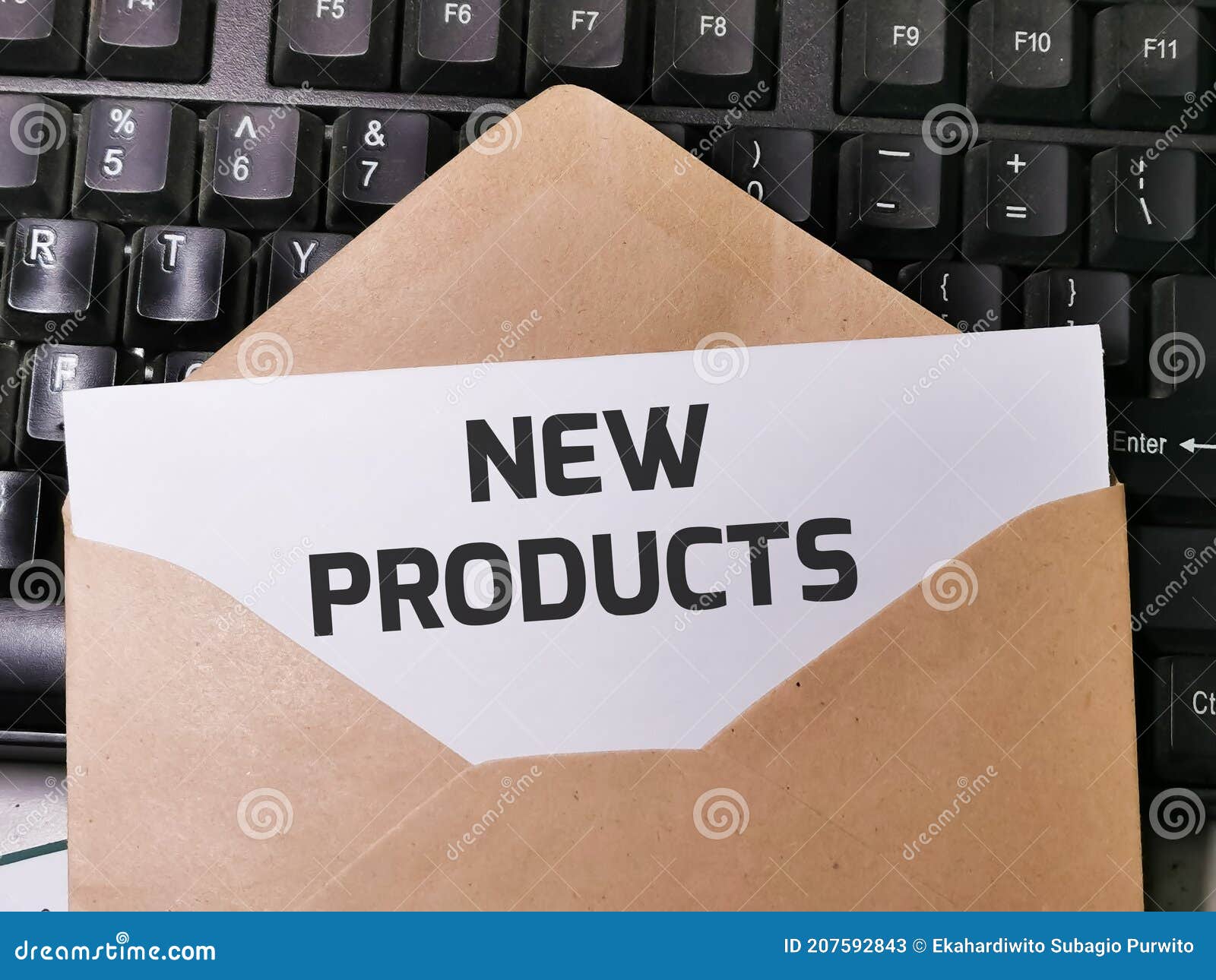 Text NEW PRODUCTS Written on White Paper Note in the Envelope Stock ...