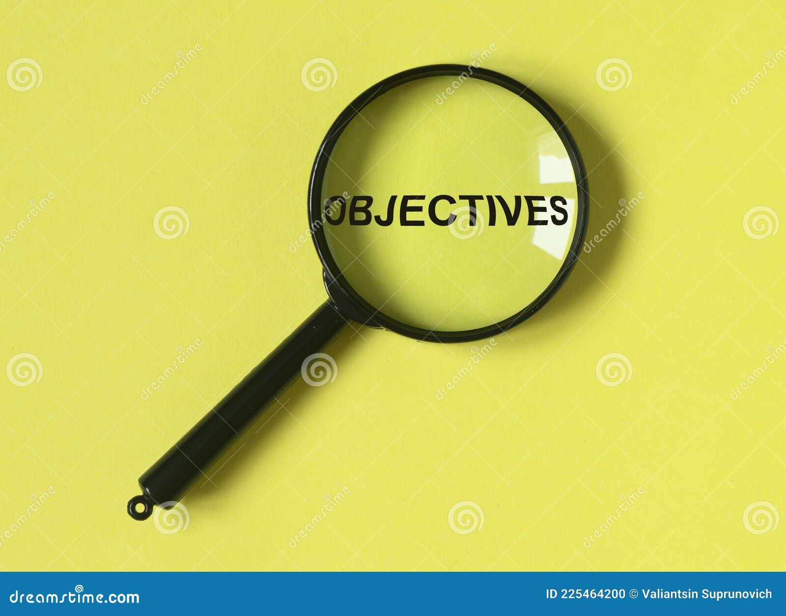 Text Objectives through Magnifier on Bright Yellow Background. Target ...