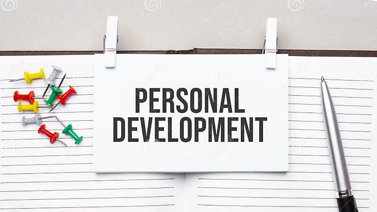 Text Personal Development on Stickers on the Diary with Office Tools ...