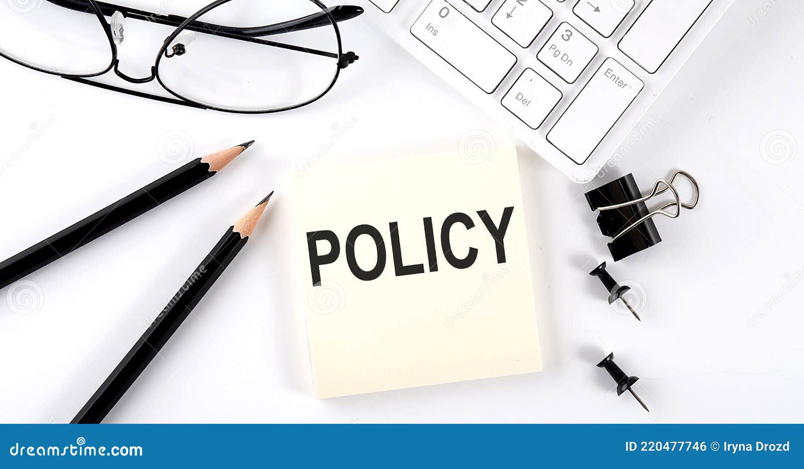 Text POLICY on the Sticker with Keyboard , Pencils and Office Tools ...