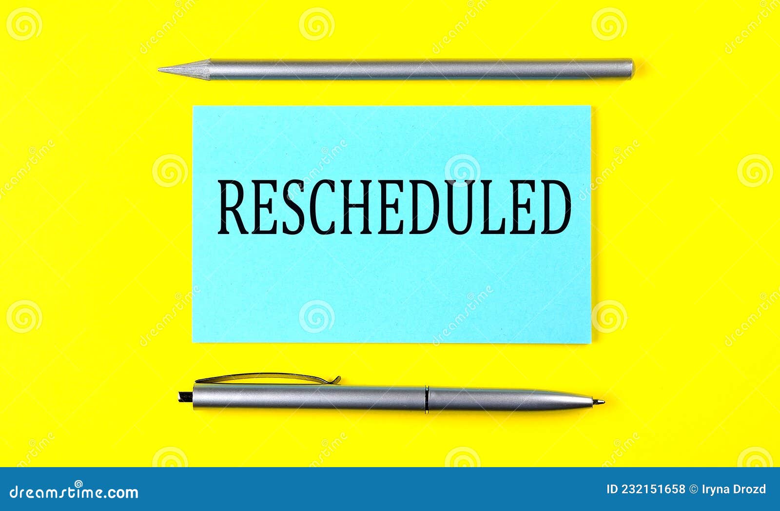 Text Rescheduled on the Blue Sticker on the Yellow Background Stock ...